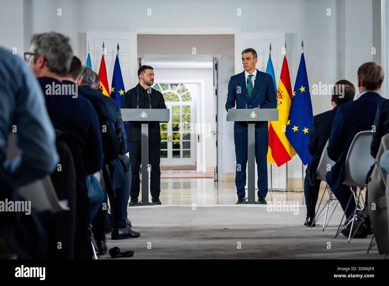 Spanish prime minister Pedro Sanchez (R) is seen speaking at the press ...
