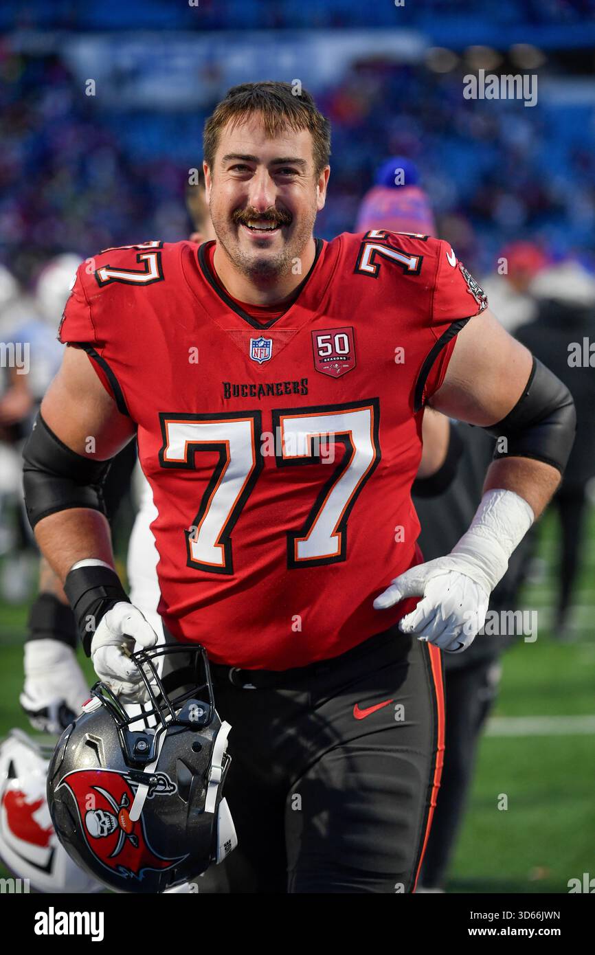 Tampa Bay Buccaneers tackle Charlie Heck (77) walks off the field after ...