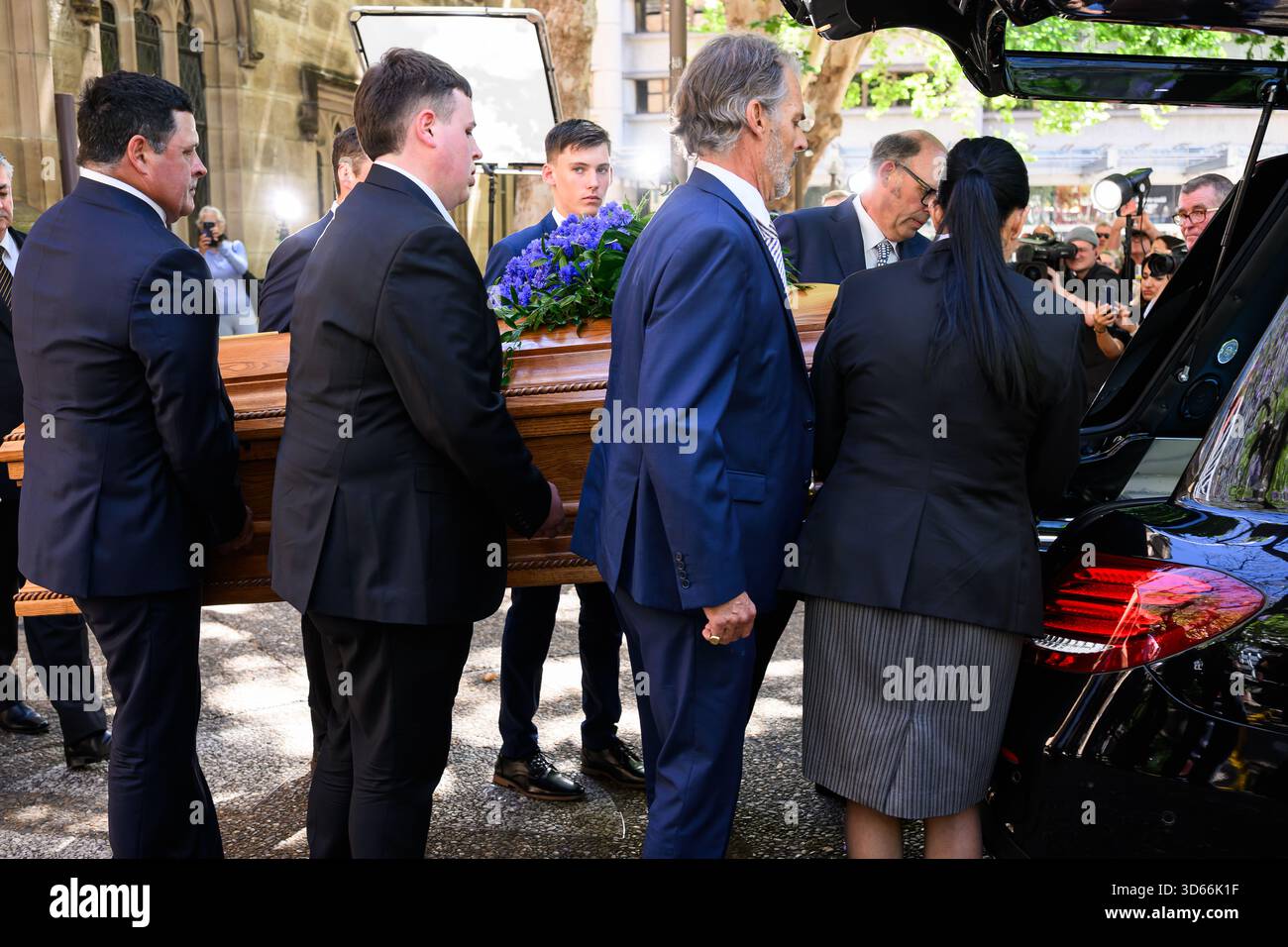 The coffin is placed in to the hearse following the state funeral ...