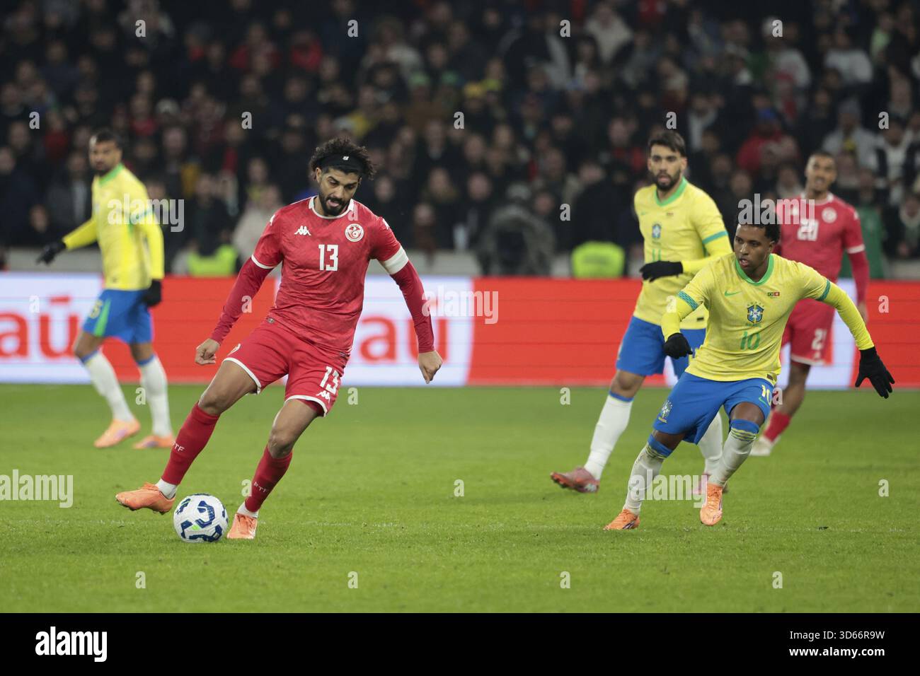 Ferjani Sassi of Tunisia, Rodrygo of Brazil during the international ...