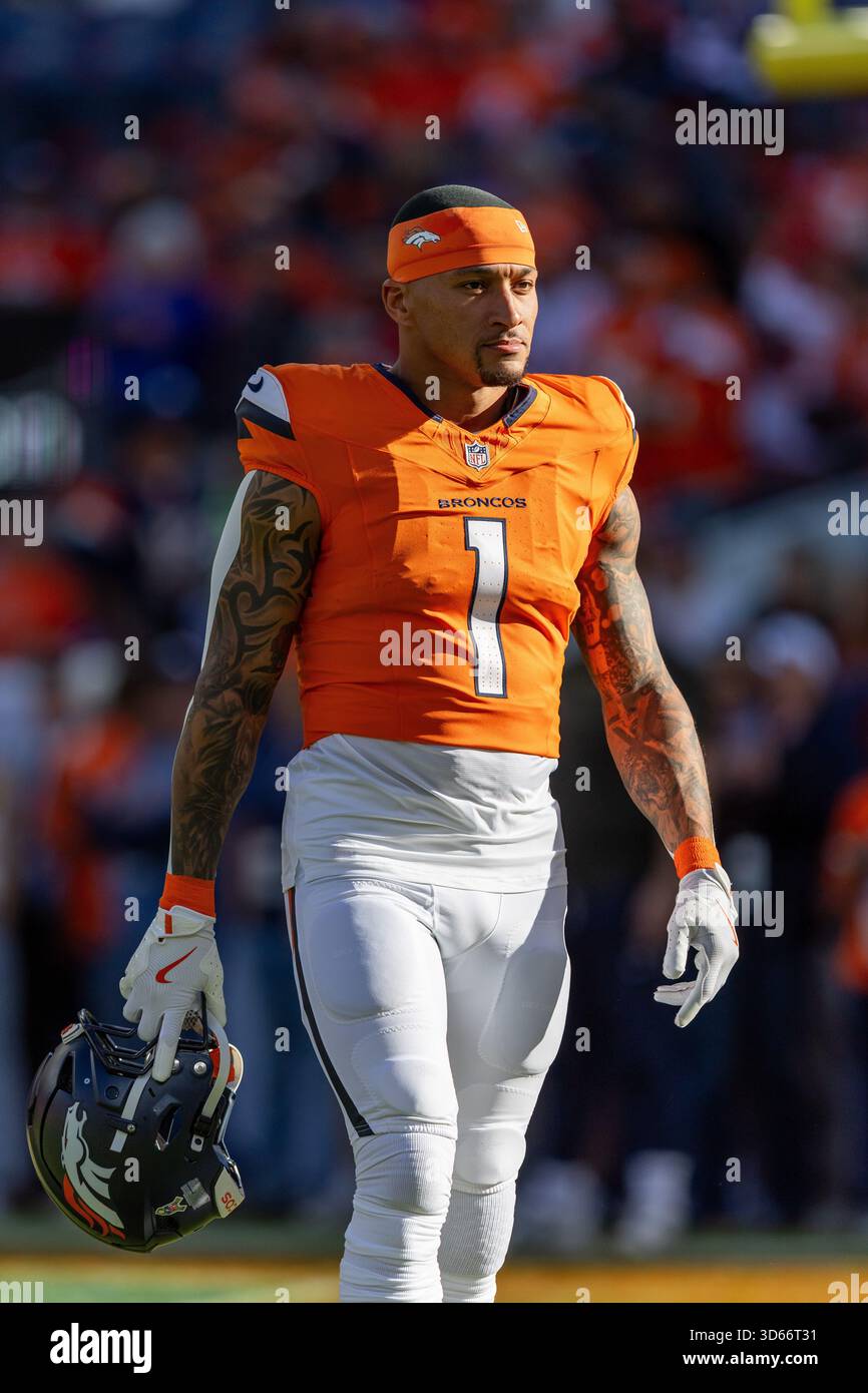 Denver Broncos tight end Evan Engram (1) warms up before playing ...