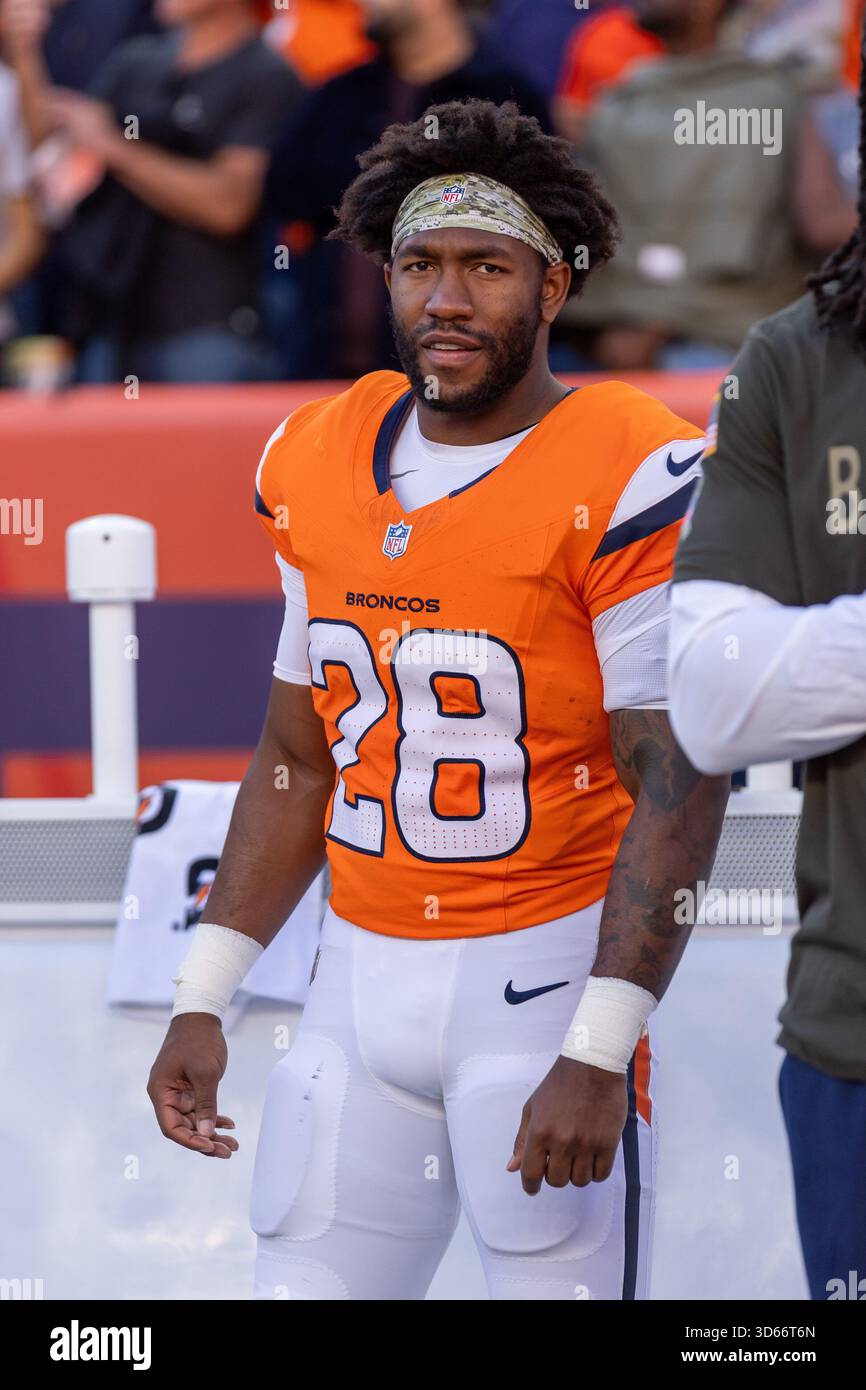 Denver Broncos running back Tyler Badie (28) stands for the national ...