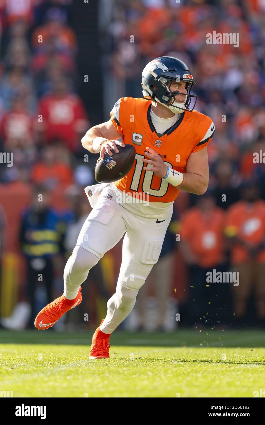 Denver Broncos quarterback Bo Nix (10) rolls out against the Kansas ...
