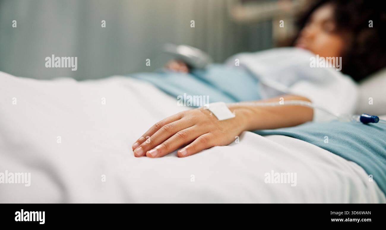 Sick, child and hands with iv drip in hospital bed for nutrition ...