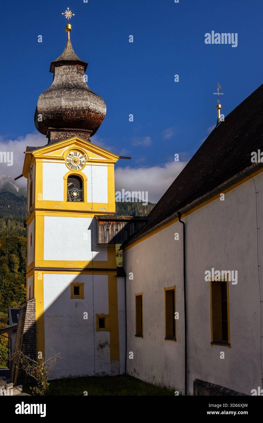 The photograph showcases a picturesque church, likely located in a ...