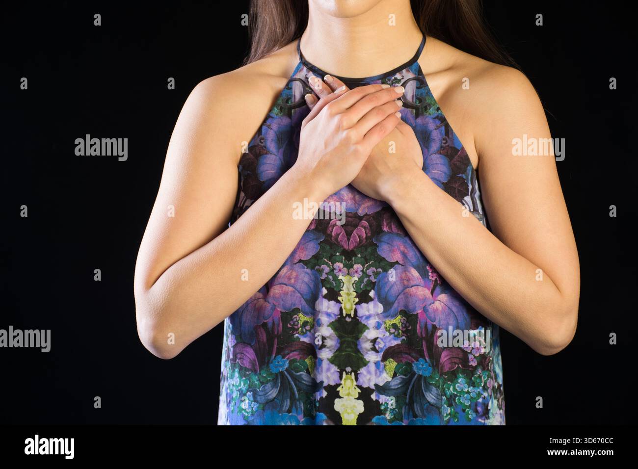 One woman hands prayer chest hi-res stock photography and images - Alamy