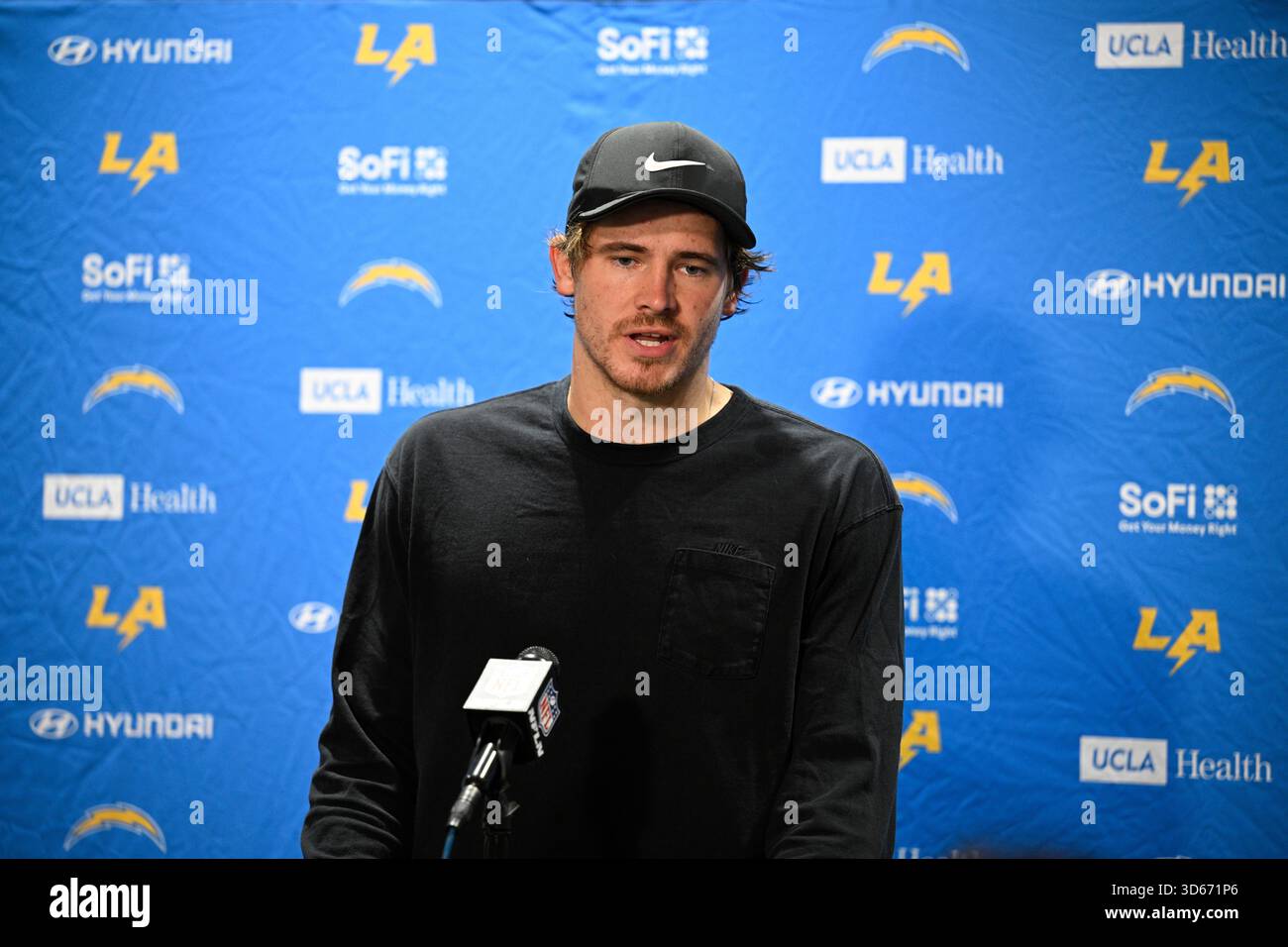 Los Angeles Chargers quarterback Justin Herbert talks with reporters ...