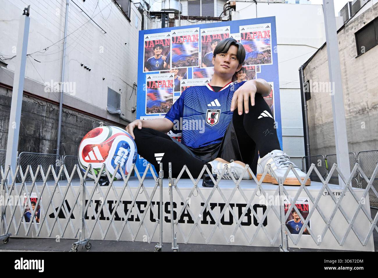 A giant statue of Takefusa Kubo wearing the new Adidas Japan national ...
