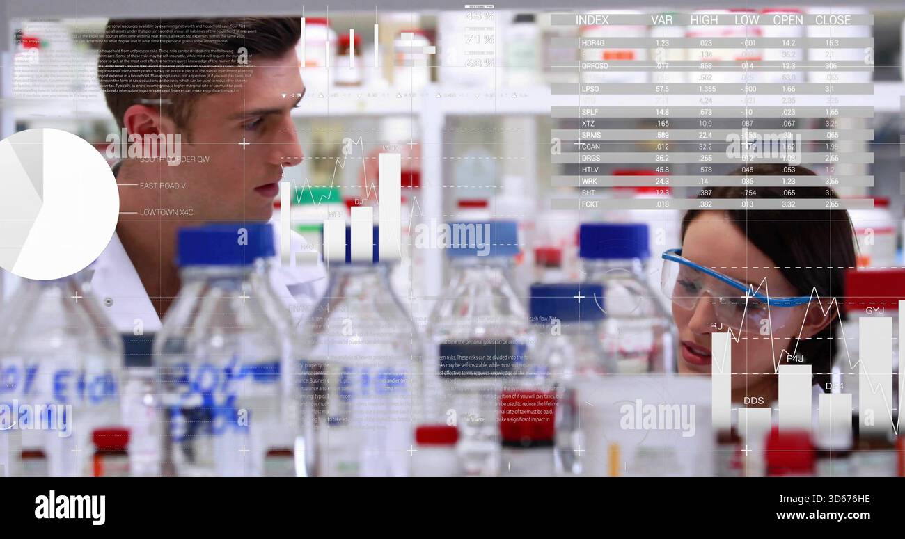Two researchers in white lab coats discussing data at lab bench, with ...