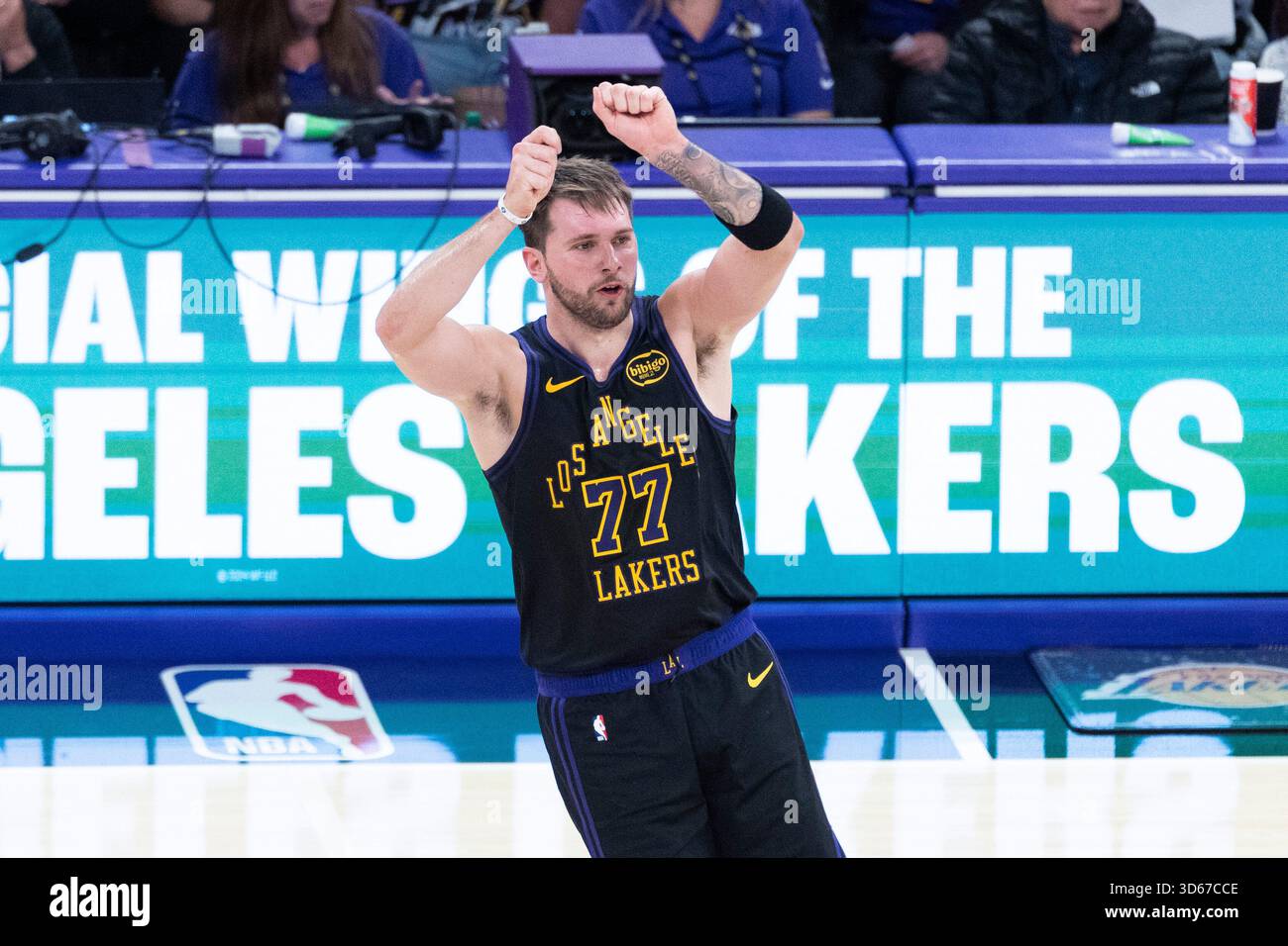 Los Angeles Lakers’ Luka Don?i? (77) reacts after hitting a 3-point ...