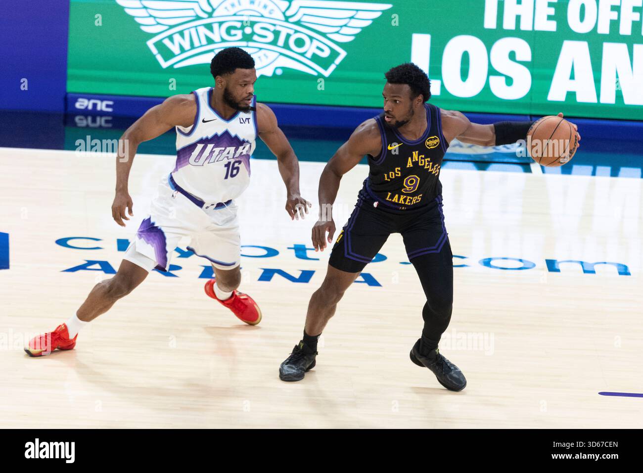Los Angeles Lakers’ Bronny James (9) is defended by Utah Jazz's Elijah ...