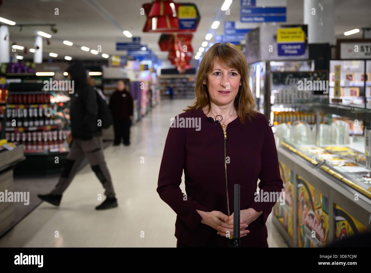 British Chancellor of the Exchequer Rachel Reeves speaks to the media ...
