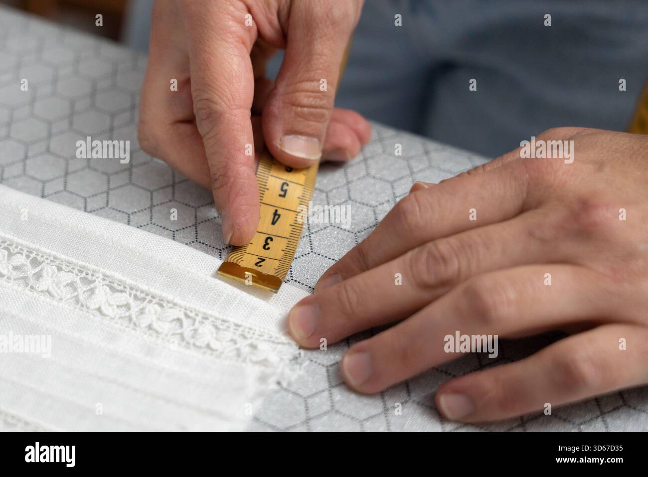 Hands accurately measuring white hi-res stock photography and images ...