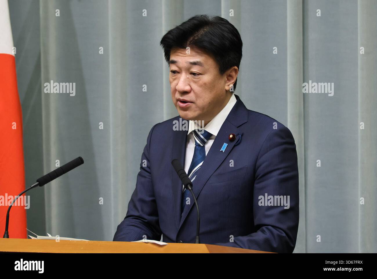 Japanese Chief Cabinet Secretary Minoru Kihara attends a press ...