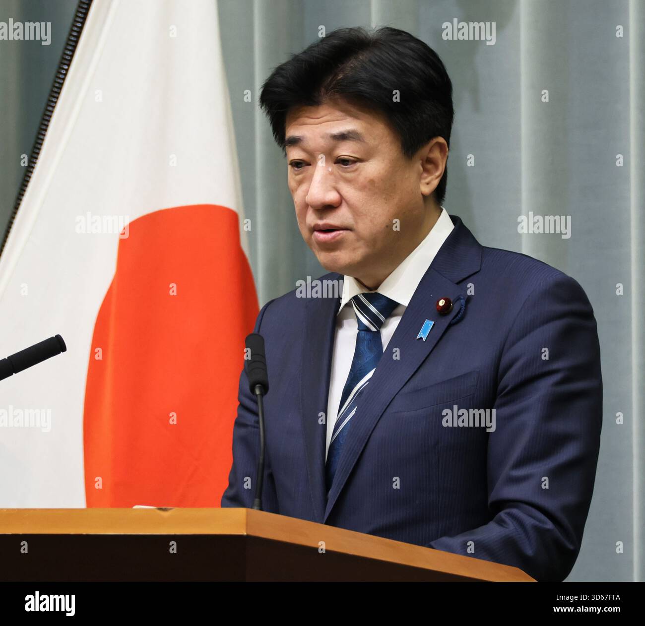 Japanese Chief Cabinet Secretary Minoru Kihara attends a press ...