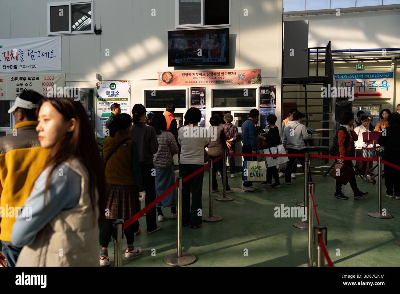 Pre-registered participants receive tickets at the 2025 Pyeongchang ...