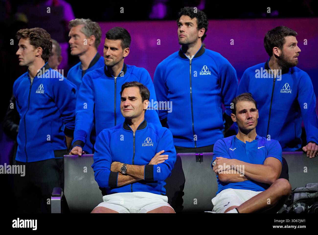 FILE - An emotional Roger Federer, left, of Team Europe sits alongside ...