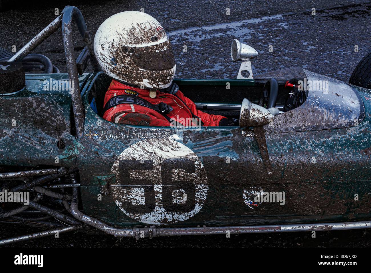 A historic Merlyn Mk17 Formula Ford (HFF) race car, covered in mud and ...