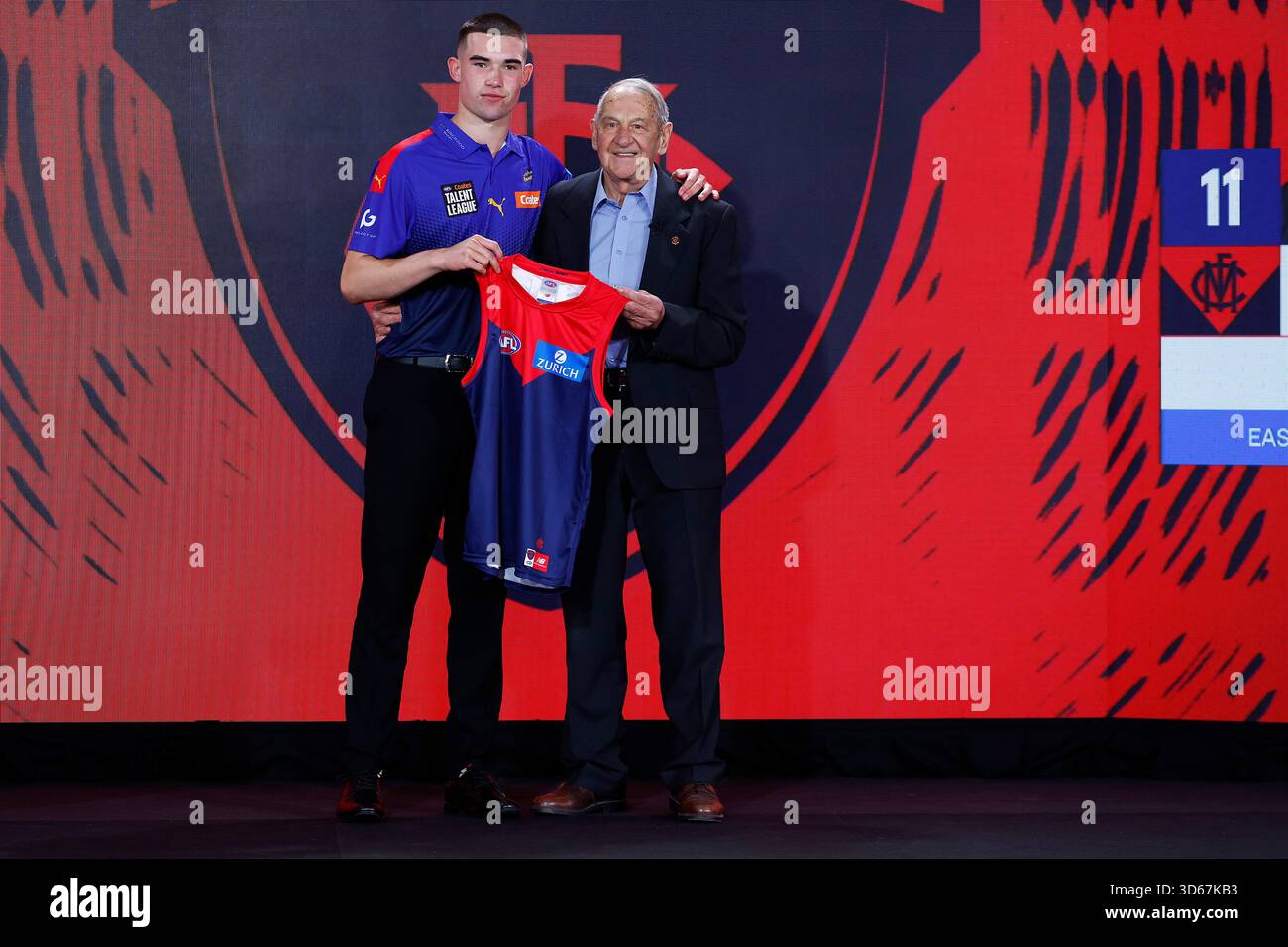 Xavier Taylor (Eastern Ranges) poses with Former Demons player, Hassa ...