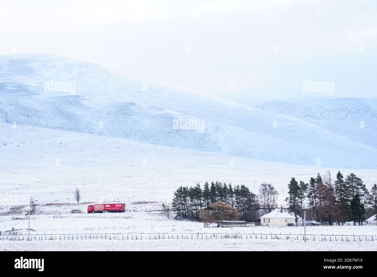 A lorry travels along the A9 near Dalwhinnie. Snow and ice warnings ...