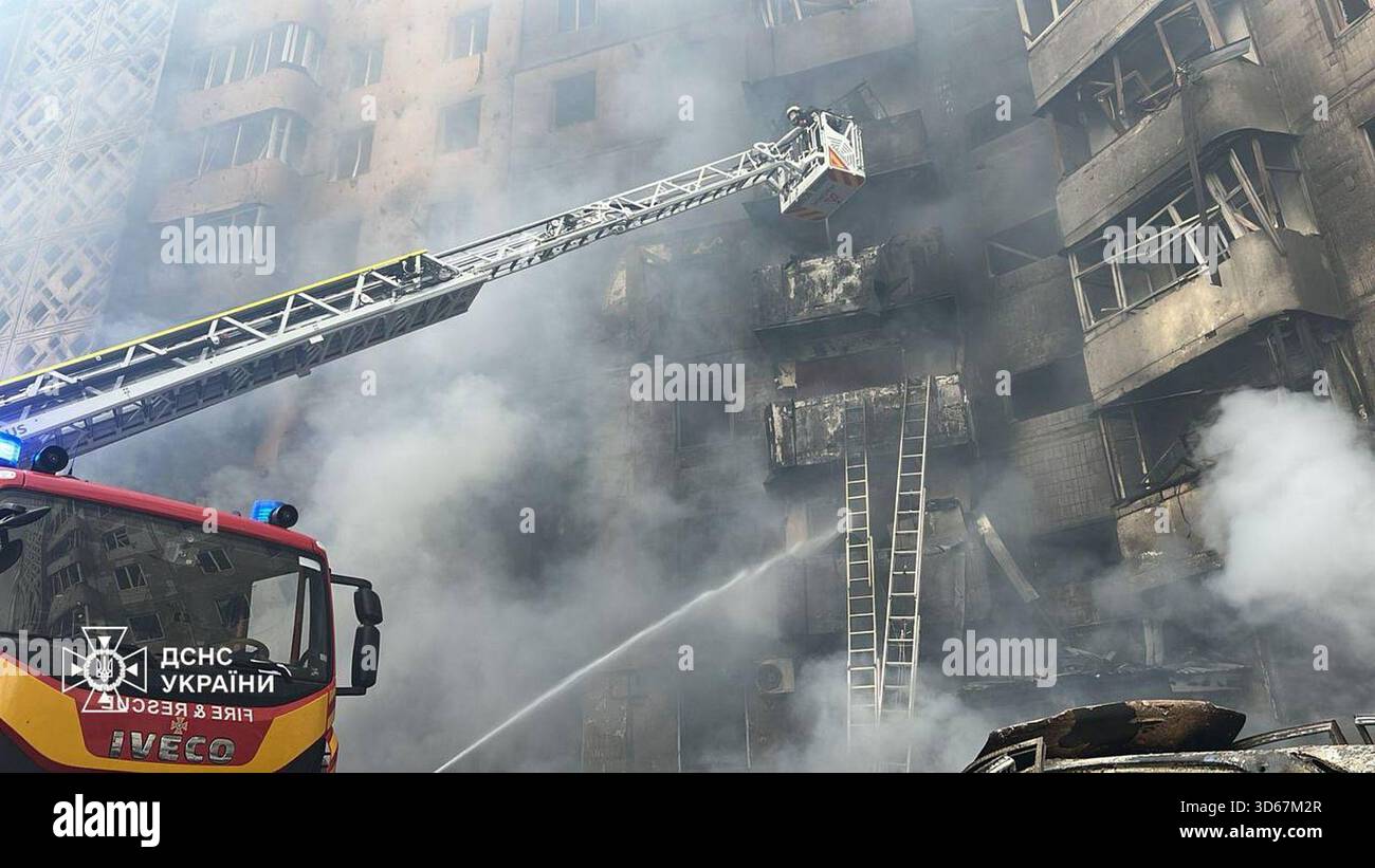 In this photo provided by the Ukrainian Emergency Service, firefighters ...