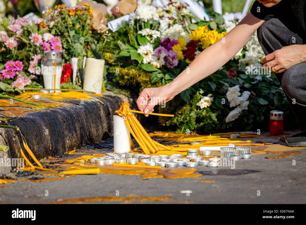 Memorial candles and flowers at the place where tragic accident ...