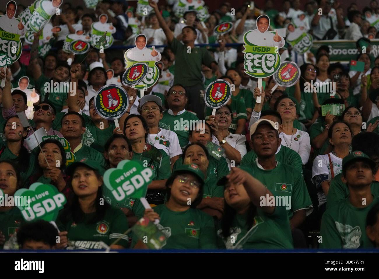 Members of the military-backed Union Solidarity and Development Party (USDP) attend a ceremony ...