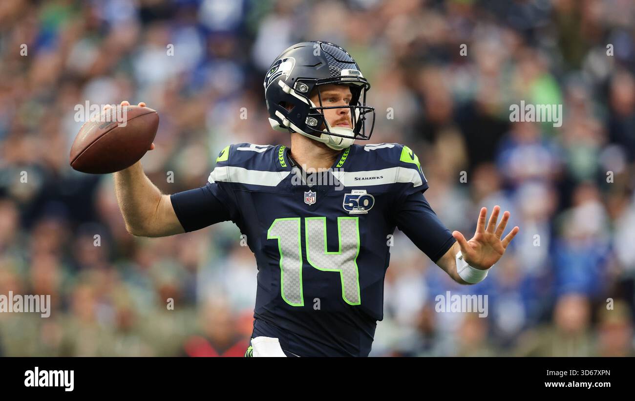 Seattle Seahawks quarterback Sam Darnold (14) looks to throw downfield ...