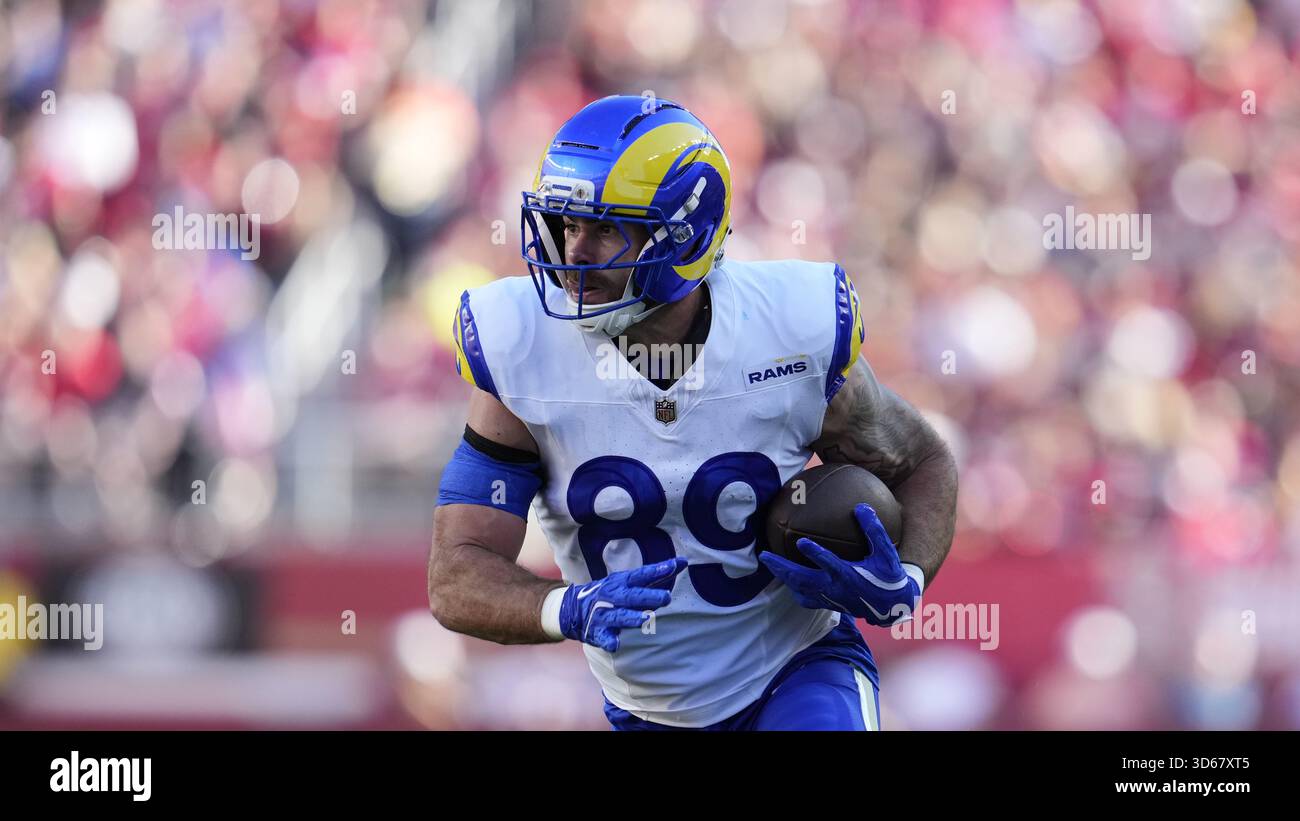 Los Angeles Rams tight end Tyler Higbee runs with the ball after a ...