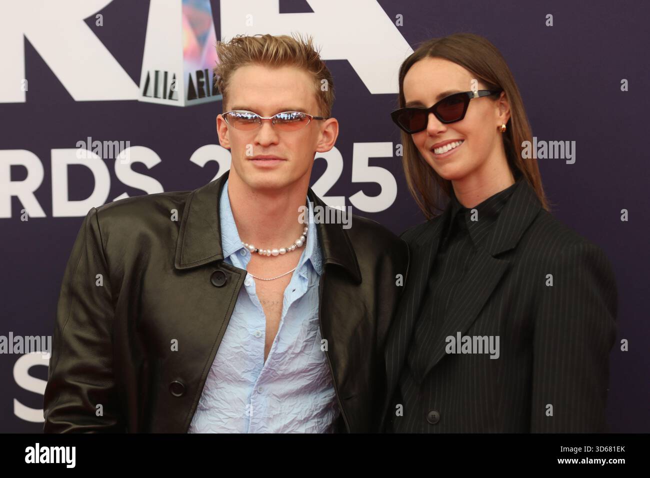 Sydney, Australia. 19th November 2025. Cody Simpson and Emma McKeon ...