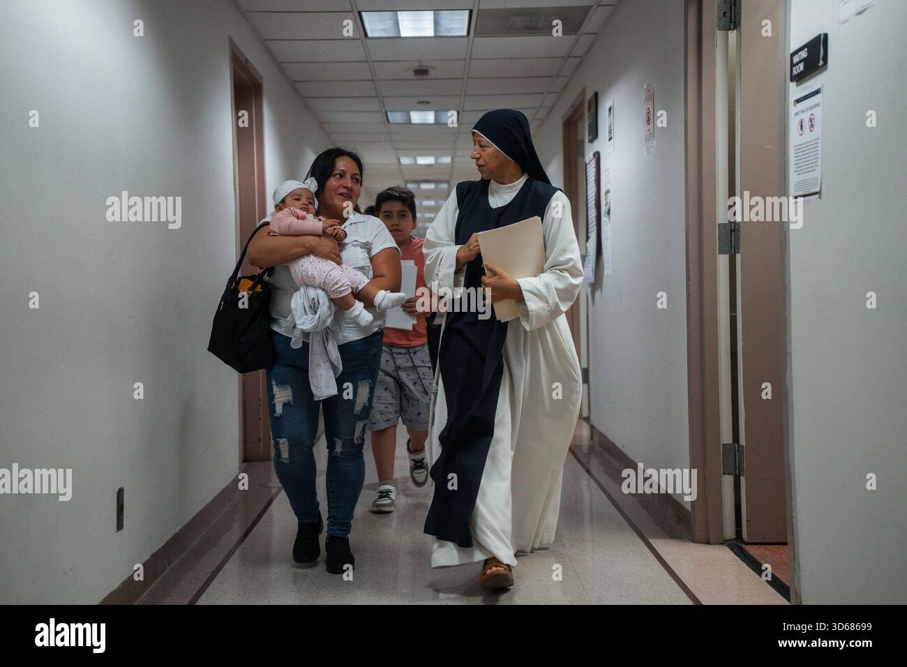 A Catholic nun accompanies a family of asylum seekers inside ...