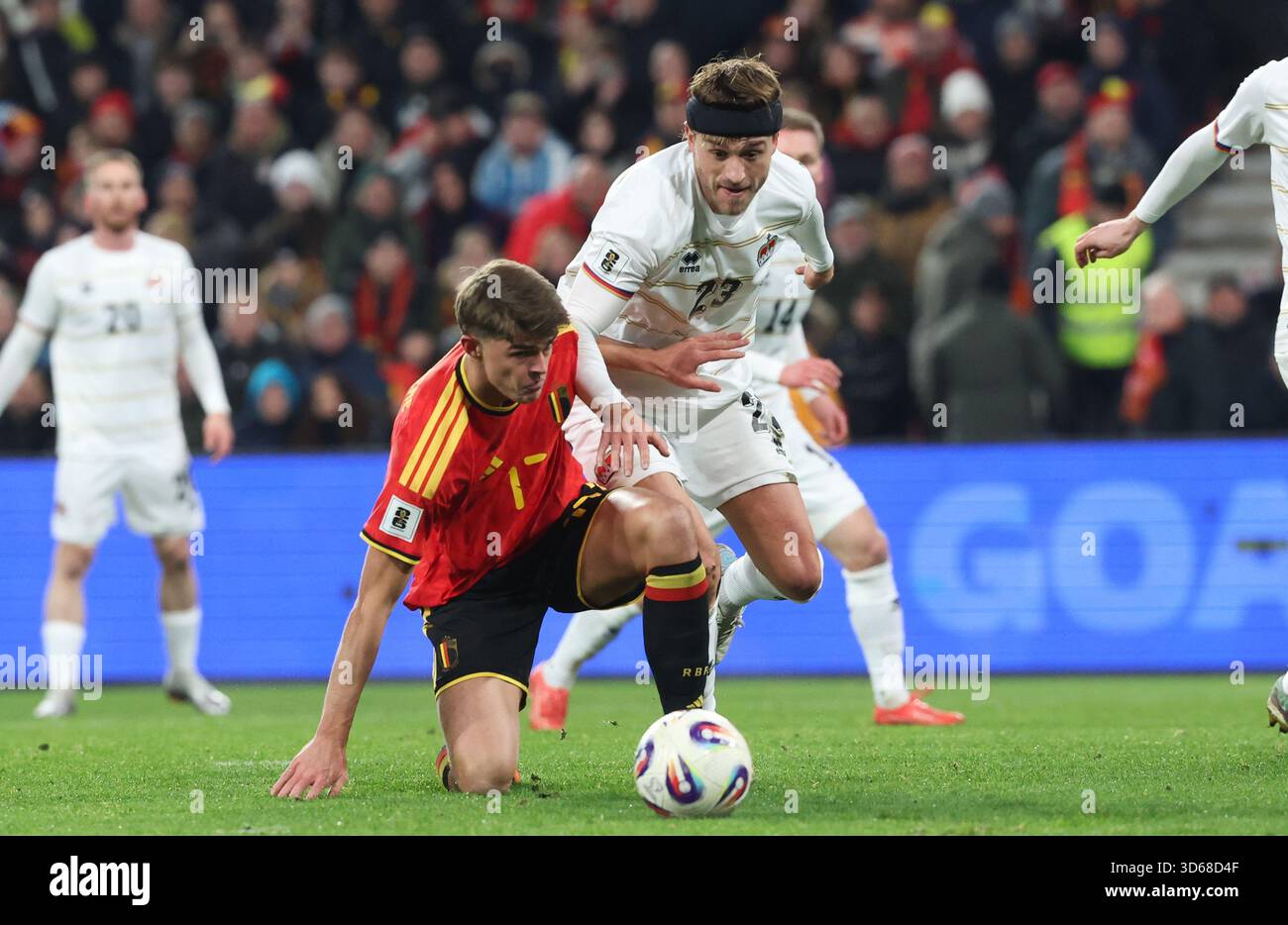 Belgium's Charles De Ketelaere and Liechtenstein's Jens Hofer fight for ...