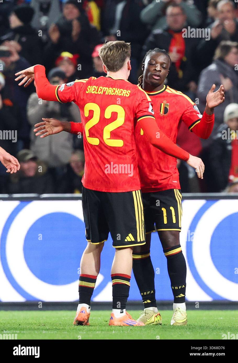 Belgium's Jeremy Doku celebrates after scoring during a soccer game ...