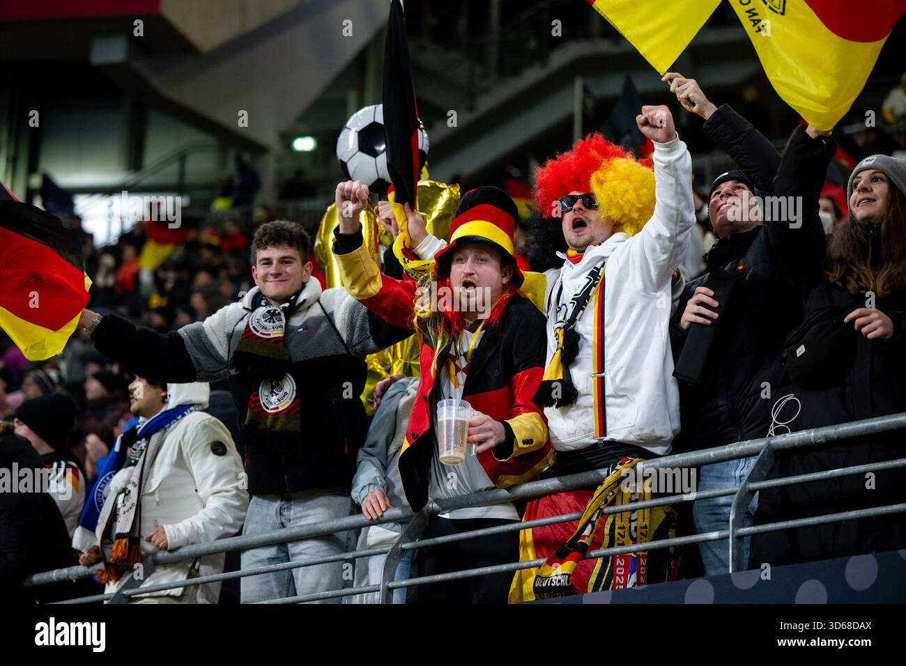 Fans [supporters] of Germany celebrate with flags / banners and fan ...