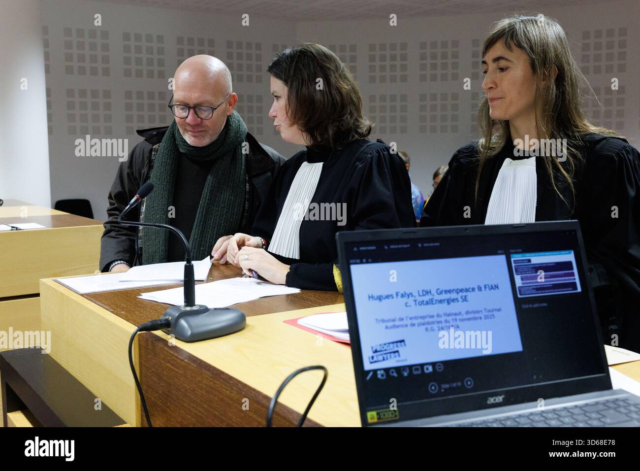 Farmer Hugues Falys and his lawyer Marie Doutrepont pictured during the ...