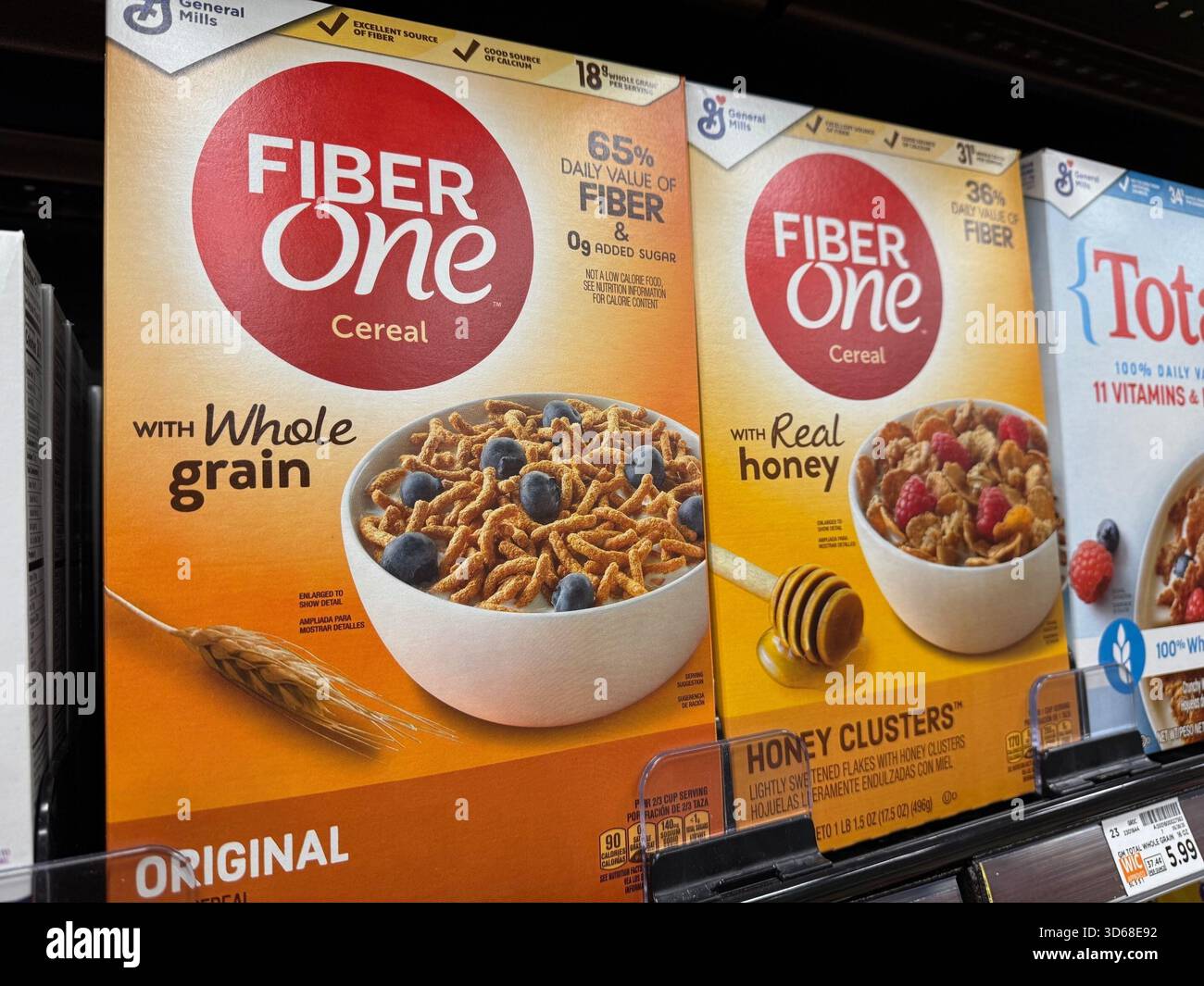 Boxes of cereal promoting fiber sit on a shelf at a Kroger grocery ...