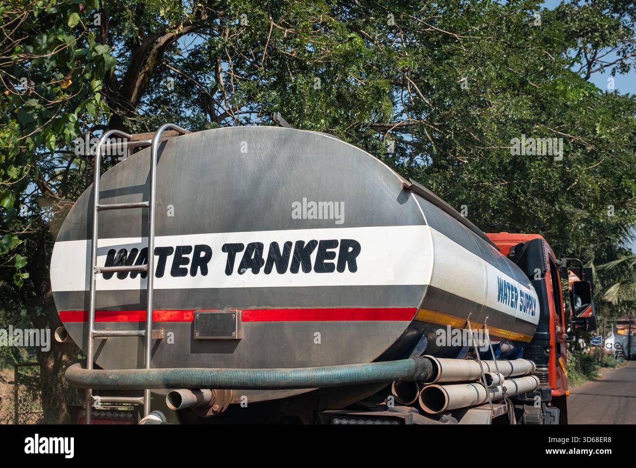 Close up of water truck supply through tanker purified water to ...