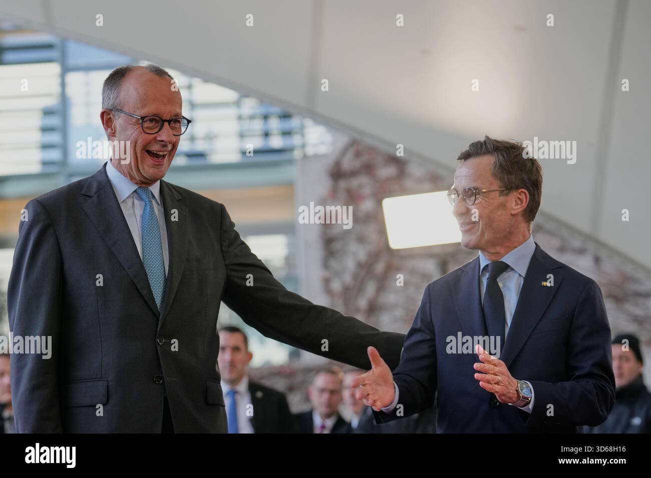 German Chancellor Friedrich Merz, left, welcomes the Prime Minister ...