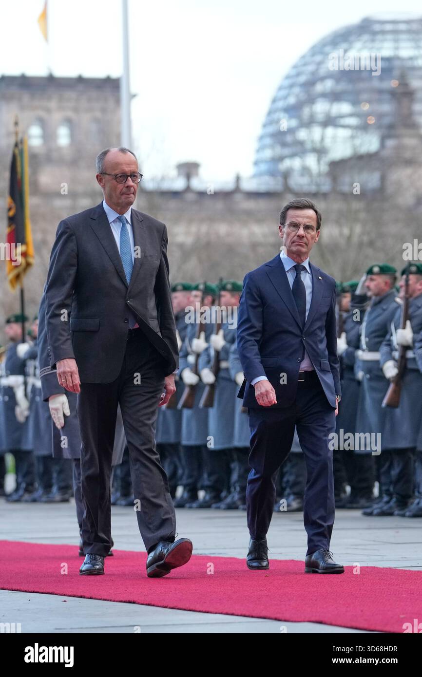 German Chancellor Friedrich Merz, left, welcomes the Prime Minister ...
