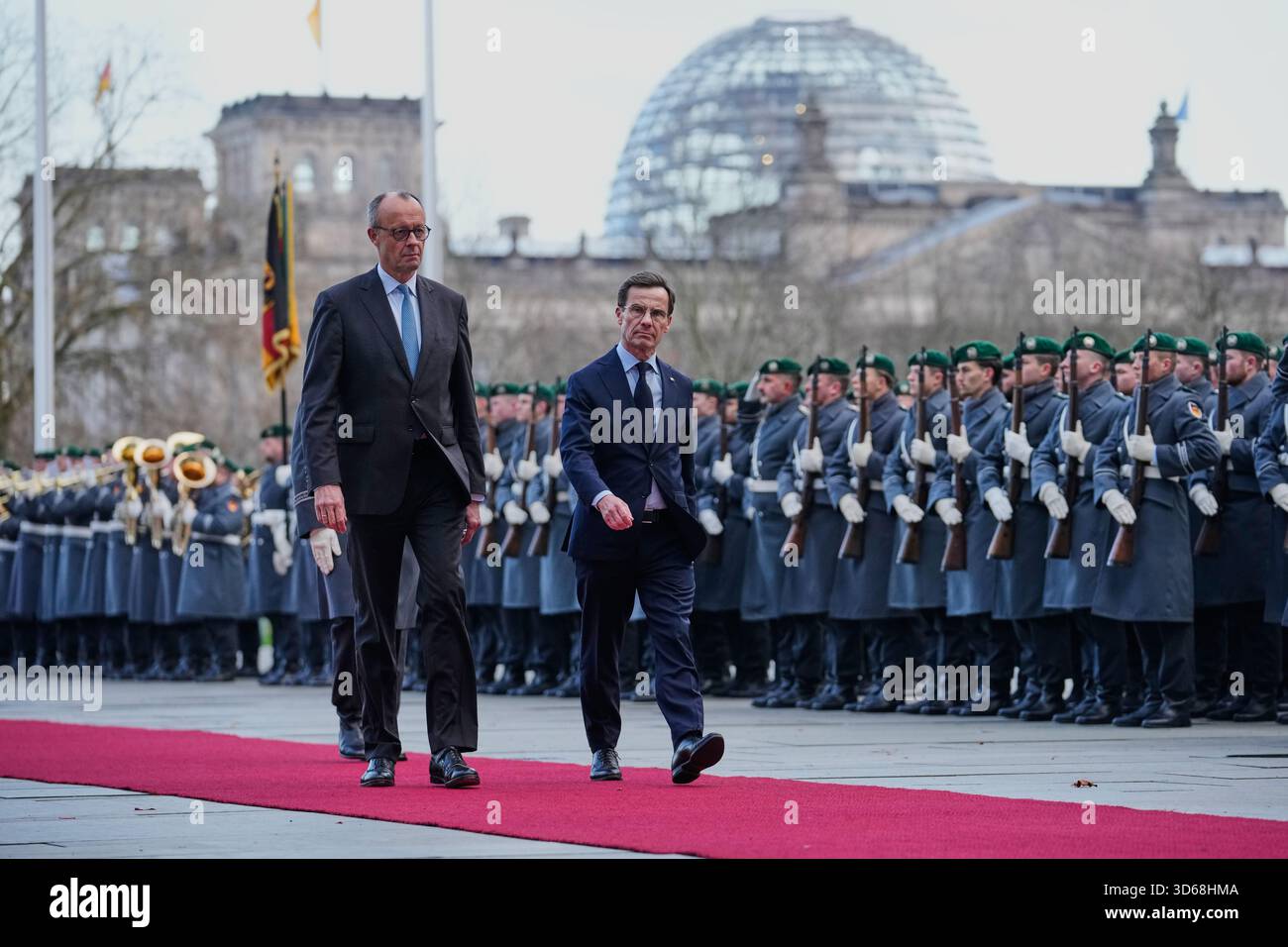 German Chancellor Friedrich Merz, left, welcomes the Prime Minister ...