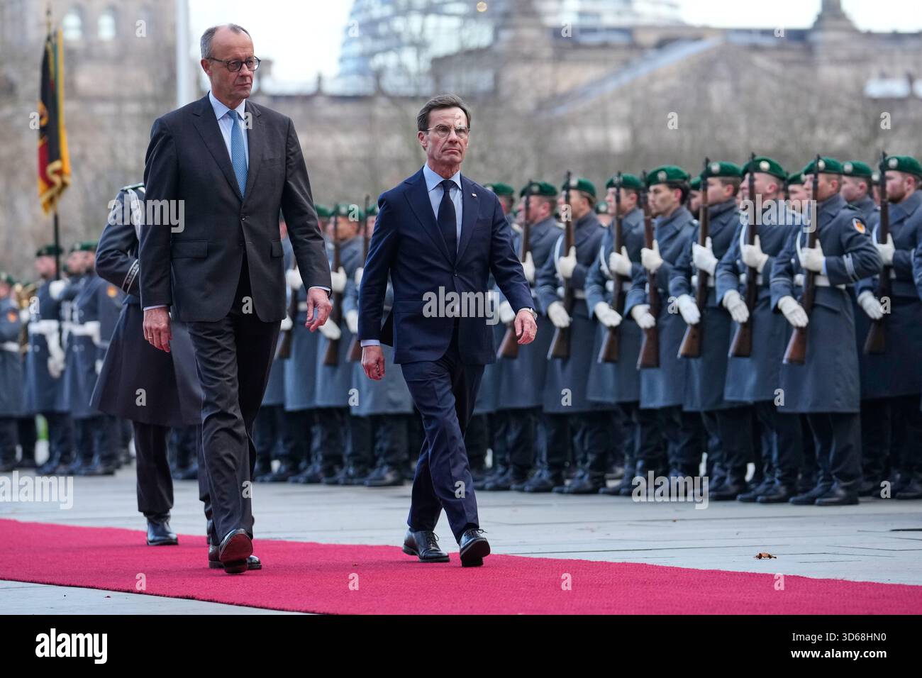 German Chancellor Friedrich Merz, left, welcomes the Prime Minister ...