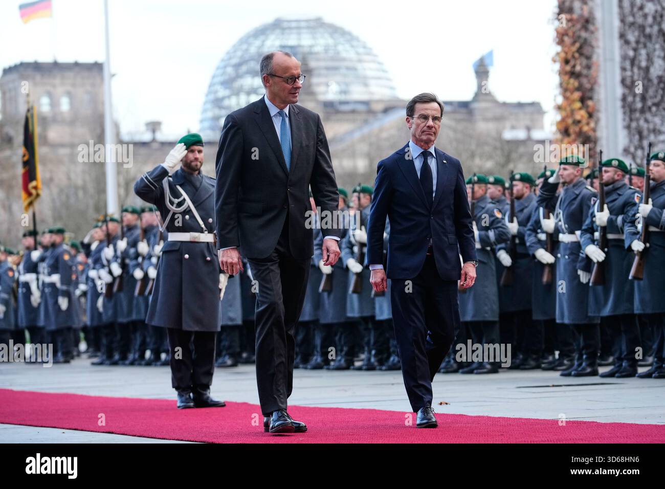 German Chancellor Friedrich Merz, left, welcomes the Prime Minister ...
