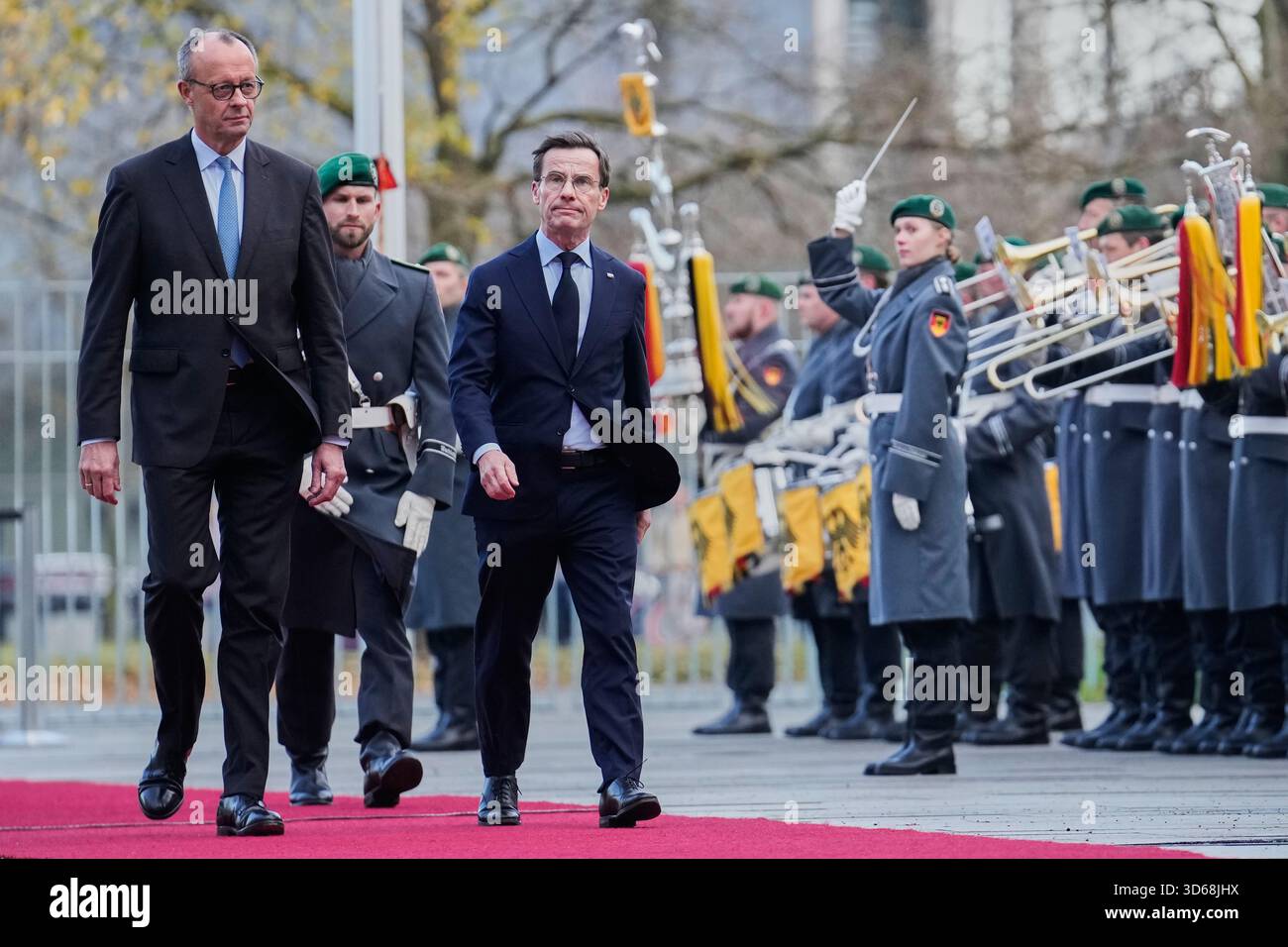 German Chancellor Friedrich Merz, left, welcomes the Prime Minister ...