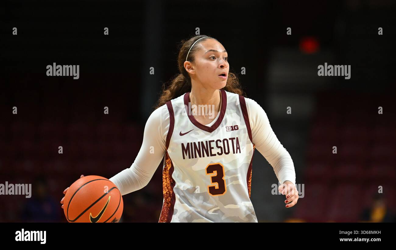 Minnesota guard Amaya Battle brings the ball down court against ...