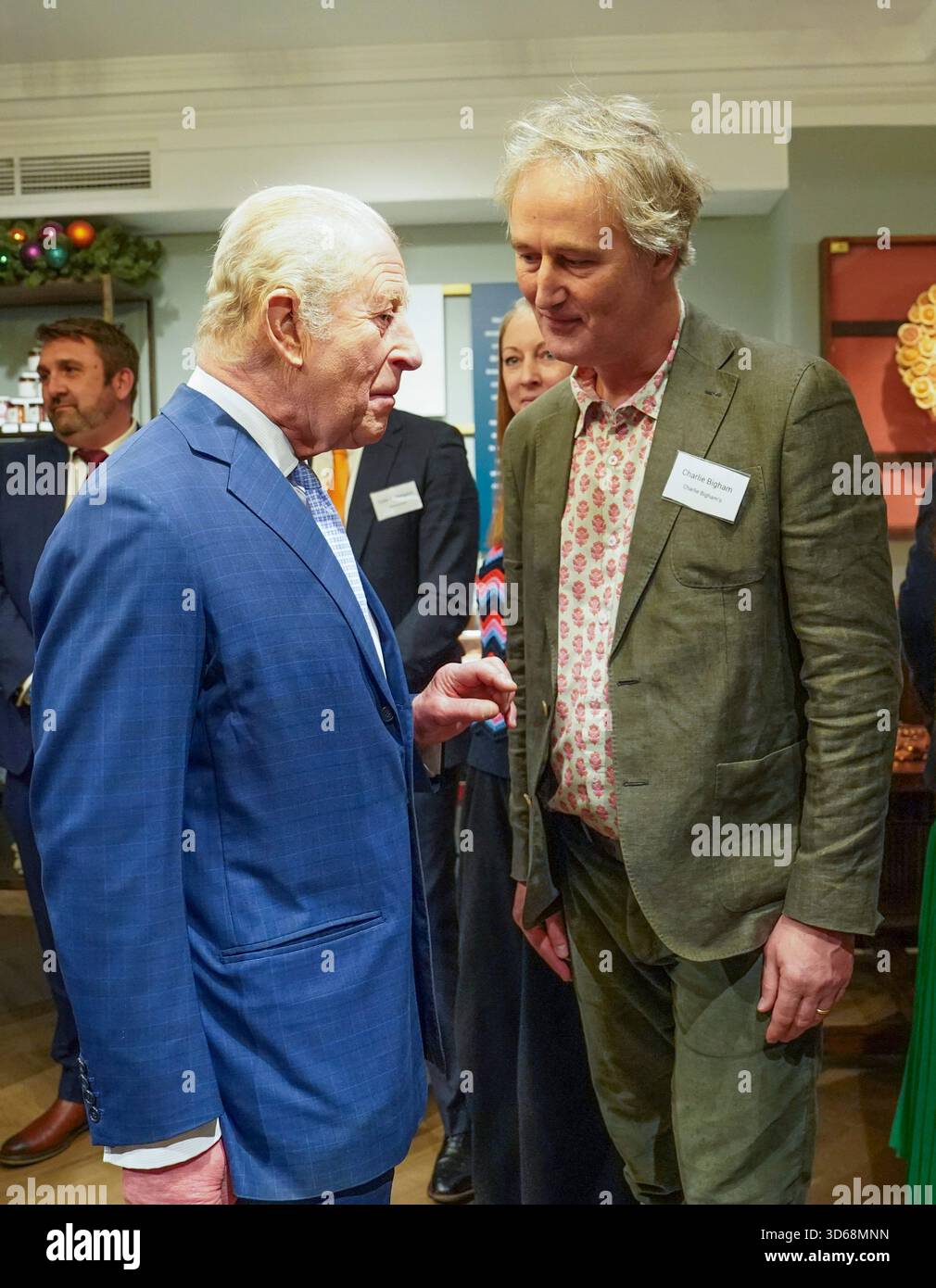 King Charles III (left) with Charlie Bingham as he joins chief ...
