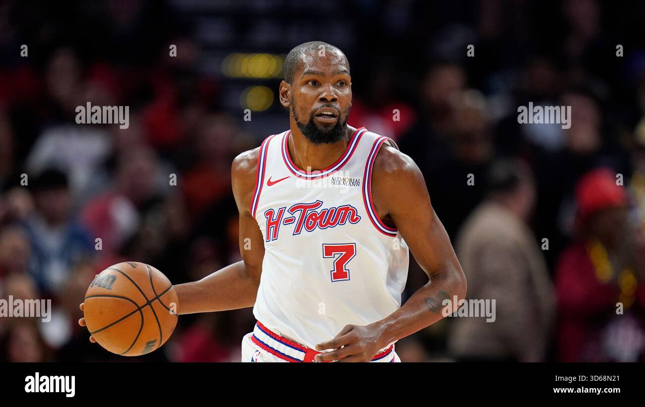 Houston Rockets forward Kevin Durant (7) dribbles against the ...