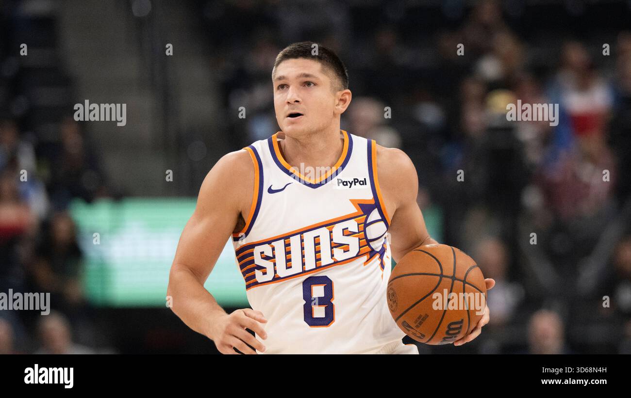 Phoenix Suns guard Grayson Allen (8) dribbles during the first half of ...