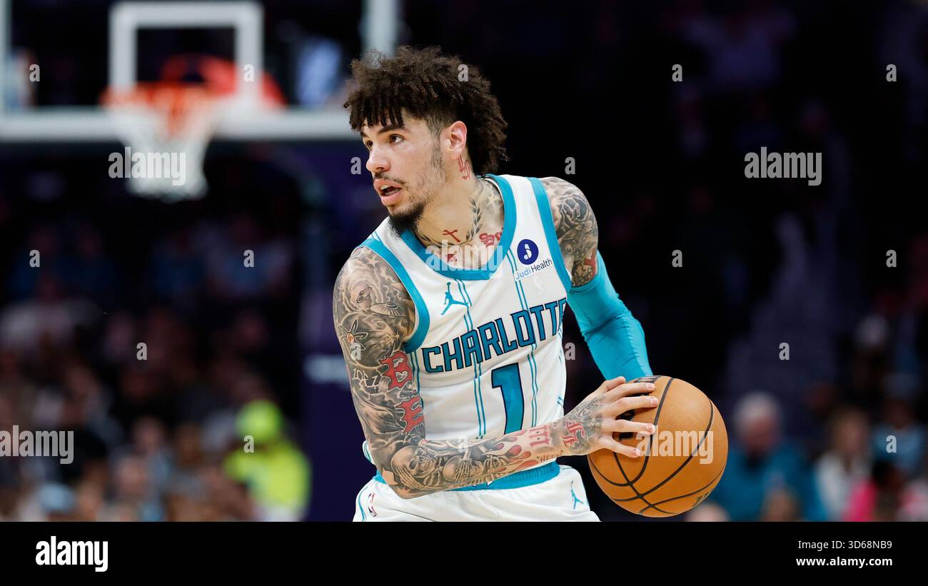 Charlotte Hornets guard LaMelo Ball looks to pass during the first half ...