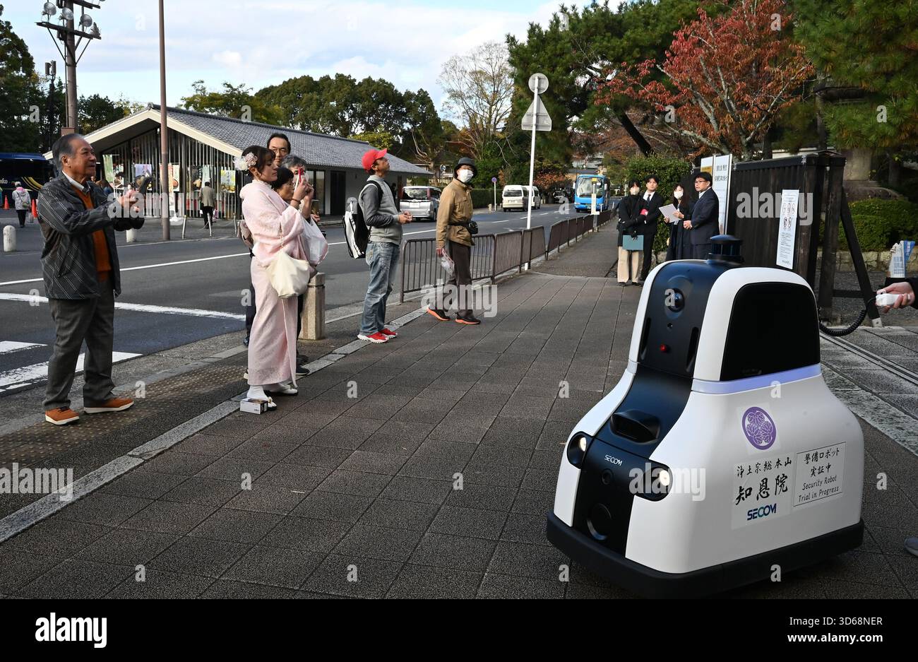 The security robot "cocobo" autonomously navigates in front of the ...