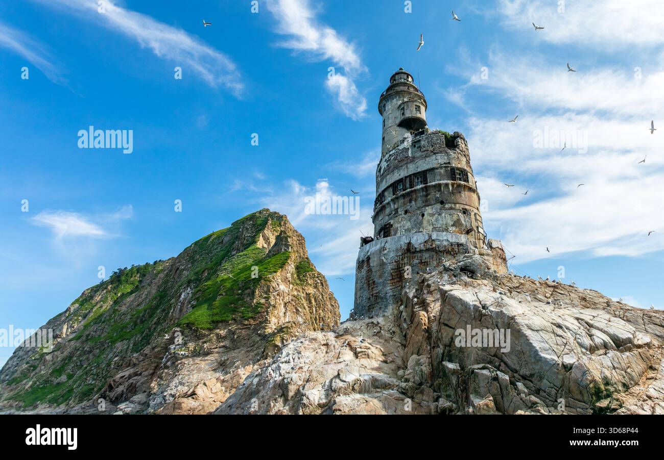 Abandoned lighthouse aniva on rock hi-res stock photography and images ...